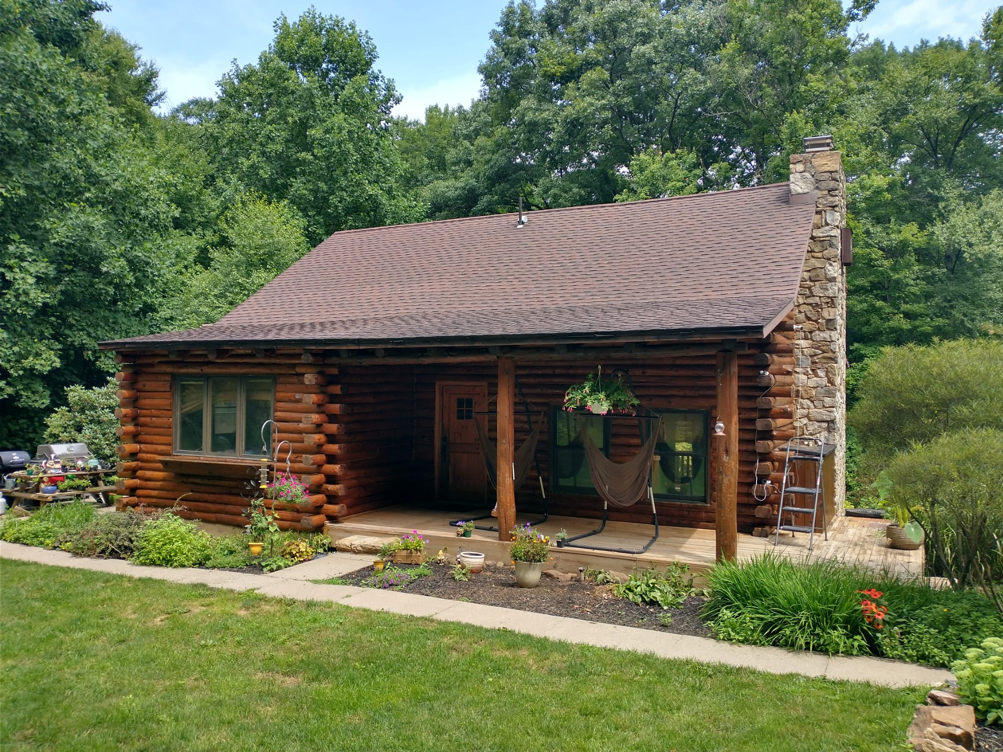 5 Steps to Staining a Log Cabin